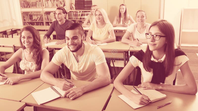 Group of Students Working in Classroom Stock Photo - Image of studying ...