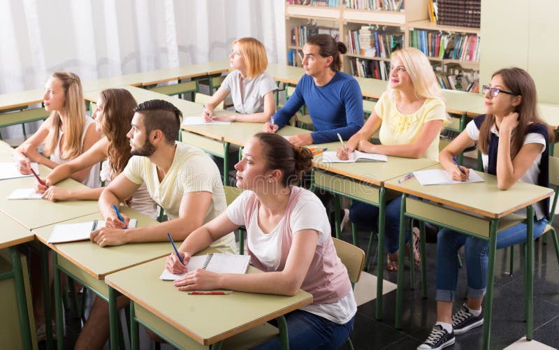 Group of Students Working in Classroom Stock Image - Image of happy ...