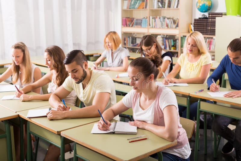 Group of Students Working in Classroom Stock Image - Image of synopsis ...