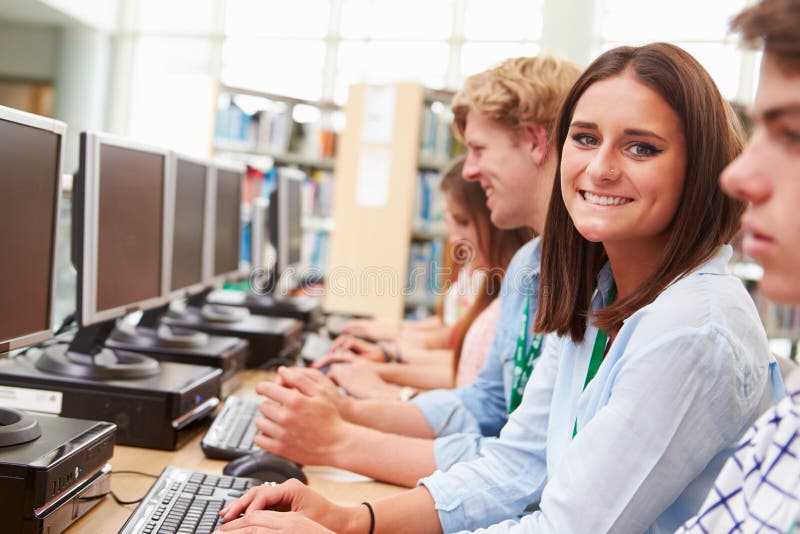Group of Students Working at Computers in Library Stock Image - Image ... Group of Students Working at Computers in Library Stock Image - Image ...