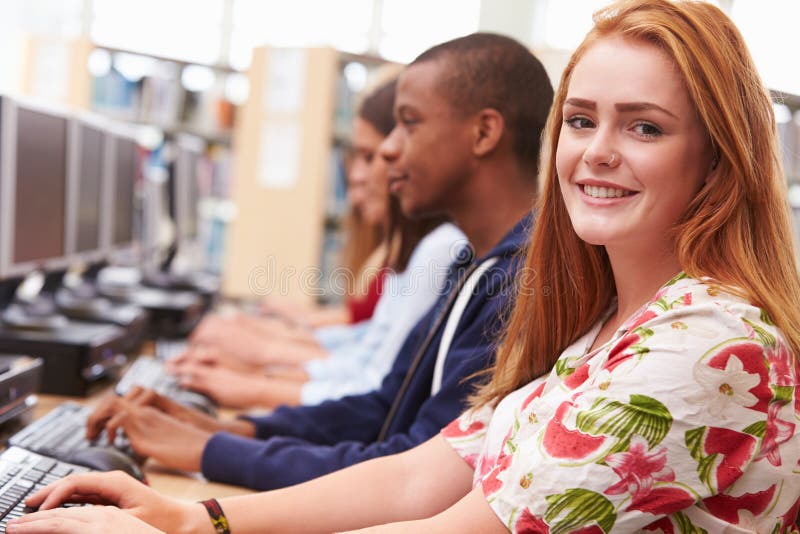 Group of Students Working at Computers in Library Stock Photo - Image ... Group of Students Working at Computers in Library Stock Photo - Image ...
