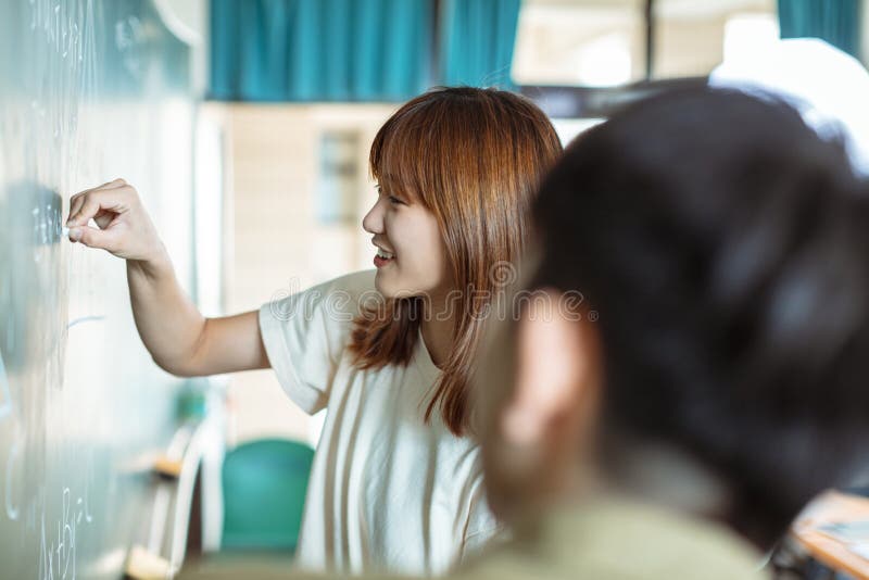 Group of Students Working on the Mathematical Problem in Classroom ...