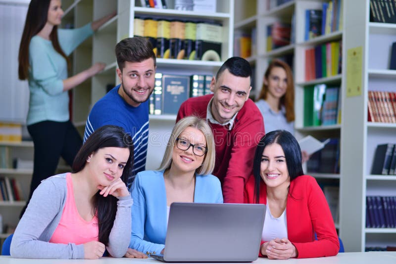Group of Students Working Together in Library with Teacher Stock Image ...