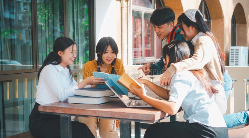 Group of Students Young University Students Consulting Doing Homework ...