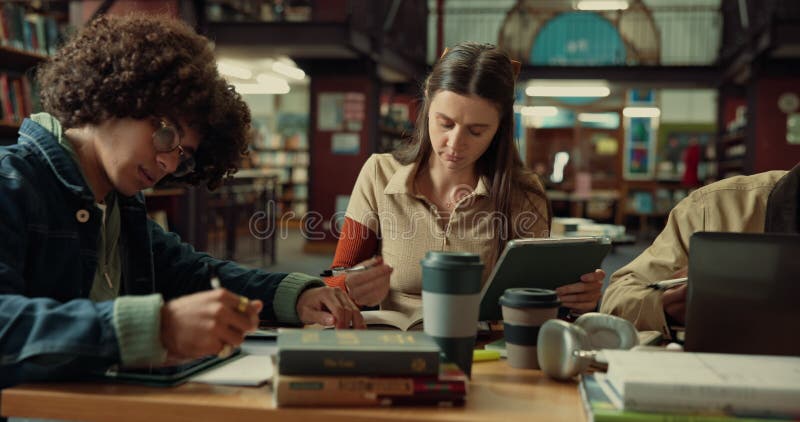 Group, Studying and Students in Library, Tablet and Deadline for ...