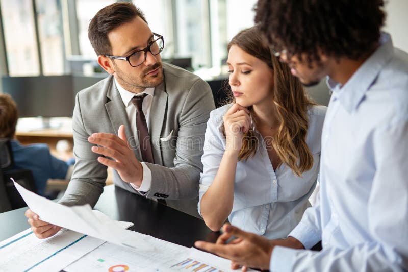 Group of Successful Business People Meeting in Office, Sharing Their ... Group of Successful Business People Meeting in Office, Sharing Their ...