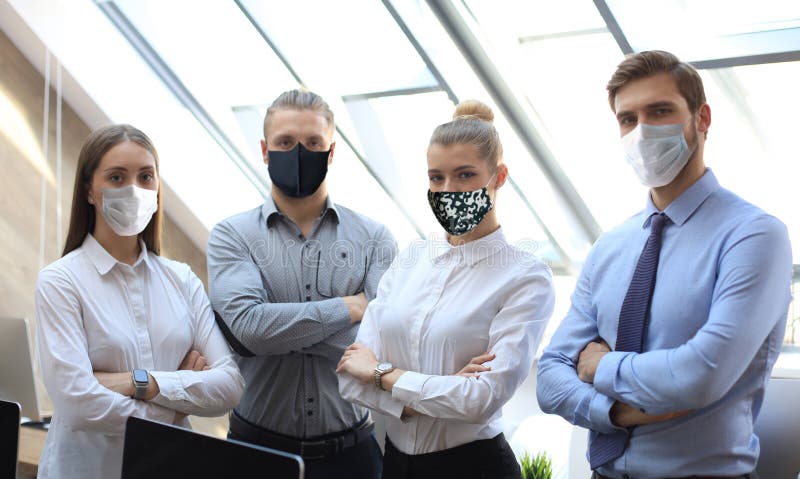Group of Successful Business People in Preventive Masks during Epidemy ... Group of Successful Business People in Preventive Masks during Epidemy ...