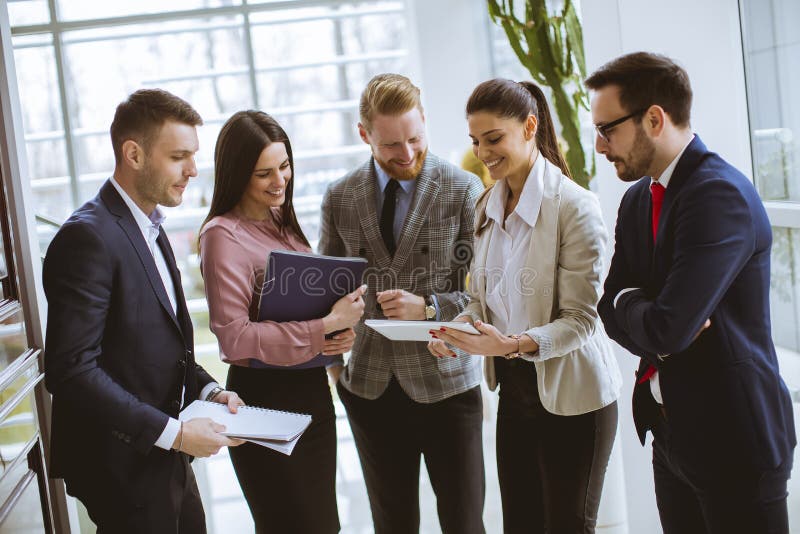 Group of Business People Standing in the Office Stock Photo - Image of ...