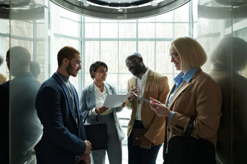 Group of Successful Intercultural Delegates Preparing Reports for ...