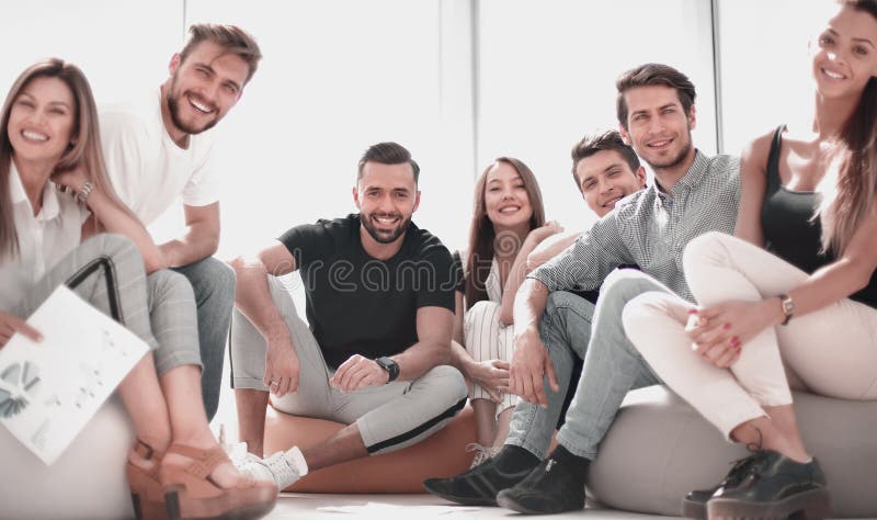 Group of Successful Young People Sitting in a New Office Stock Image ...