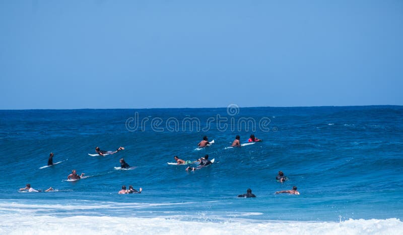 A Group of Surfers Float Together Stock Image - Image of water, tourism ...