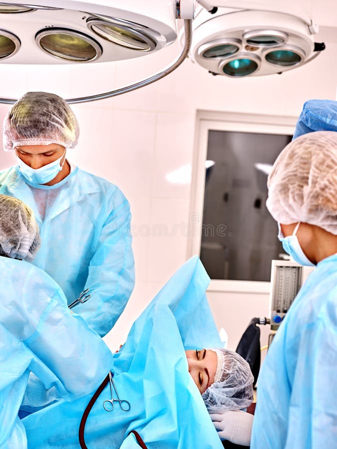 Group of Surgeon in Operating Room Stock Photo - Image of operating ...