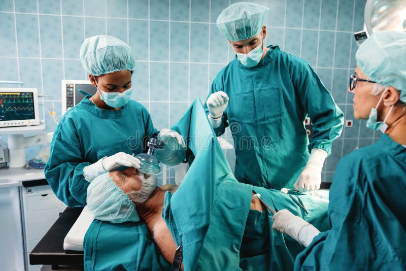 Group of Surgeon Team at Work in Operating Room in Hospital Stock Photo ...