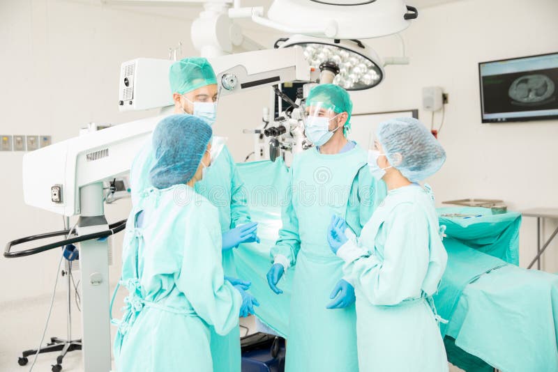 Group of Surgeons Making a Plan Stock Photo - Image of equipment ...