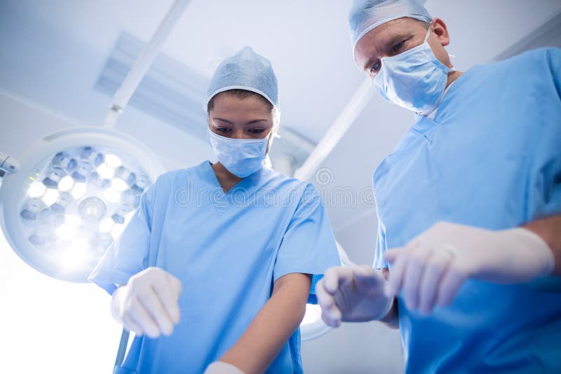 Group of Surgeons Performing Operation in Operation Room Stock Photo ...