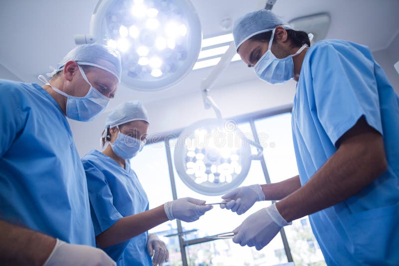 Group of Surgeons Performing Operation in Operation Room Stock Image ...