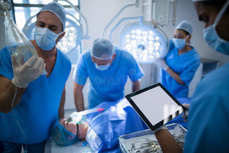 Group of Surgeons Performing Operation in Operation Room Stock Photo ...