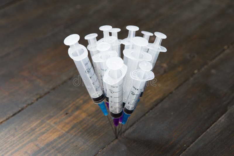 Group of Syringes on Wooden Background Stock Image - Image of treatment ...