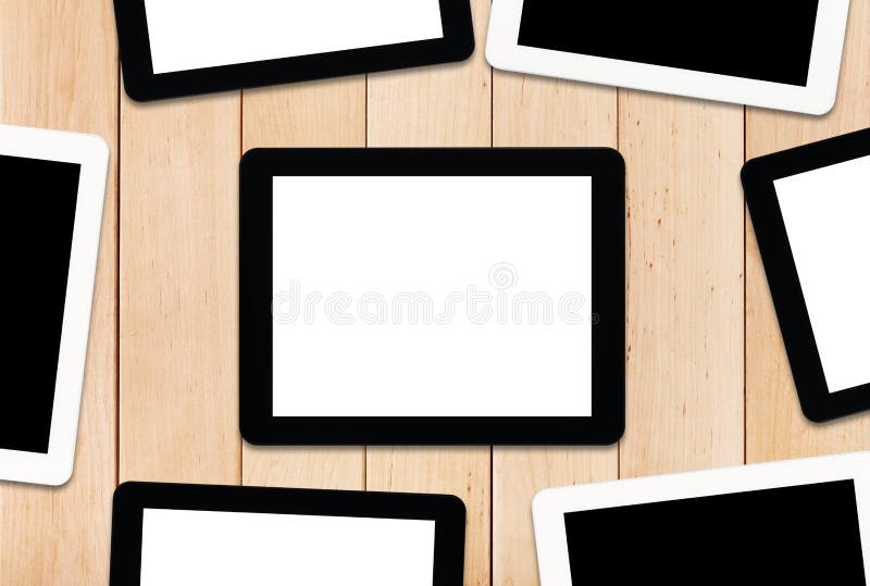 Group of Tablet PCs on a Wooden Table Stock Image - Image of white ...
