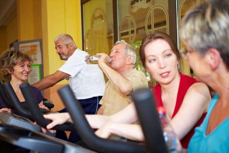 Group Taking Spinning Class in Gym Stock Photo - Image of break, care ...