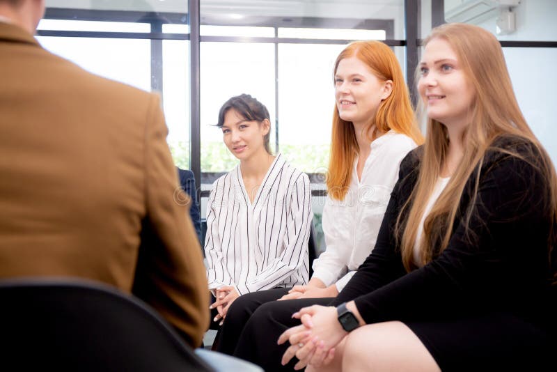 Group of Team Business People Sitting a Circle Brainstorming and ...