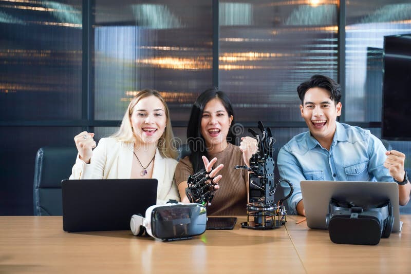 Group Team Work Programer and Engineer Working AI Robot Arm System ...