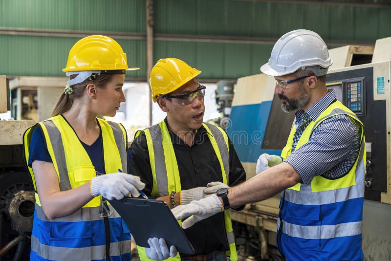 Workers and Workers are Standing in the Factory. Group Staff Standing ...