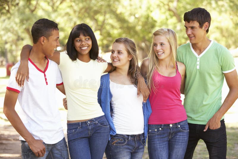 Group of Teenage Friends Having Fun in Park Stock Photo - Image of ...