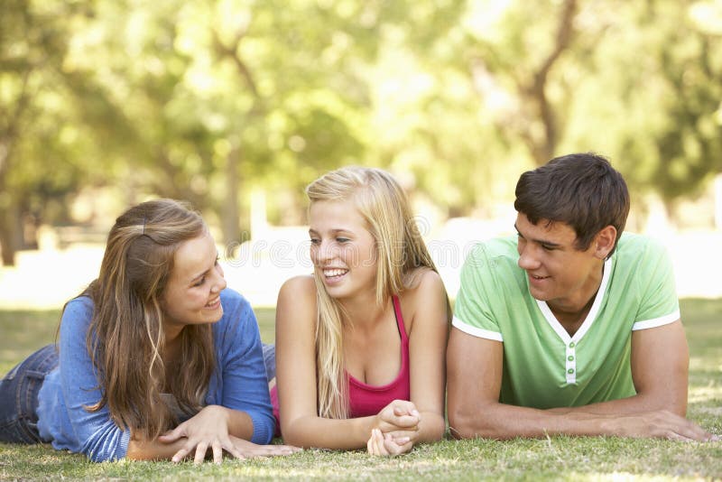 Group of Teenage Friends Having Fun in Park Stock Photo - Image of five ...