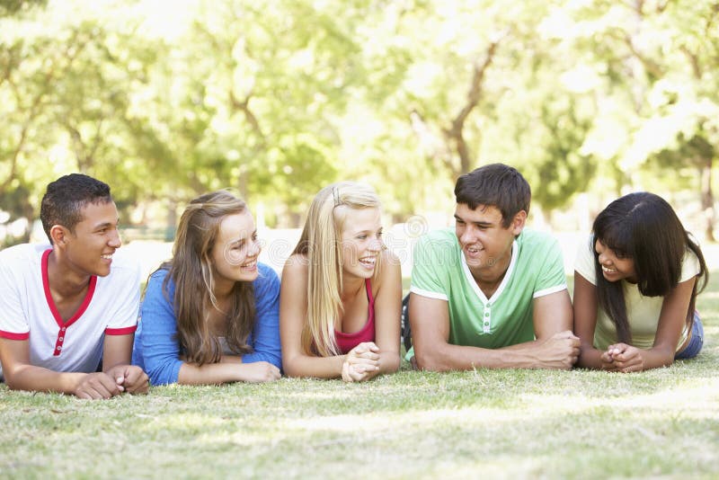 Group of Teenage Friends Having Fun in Park Stock Image - Image of ...
