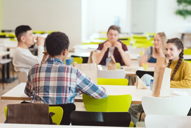 Group of Teenage Students Chatting while Taking Lunch Stock Image ...