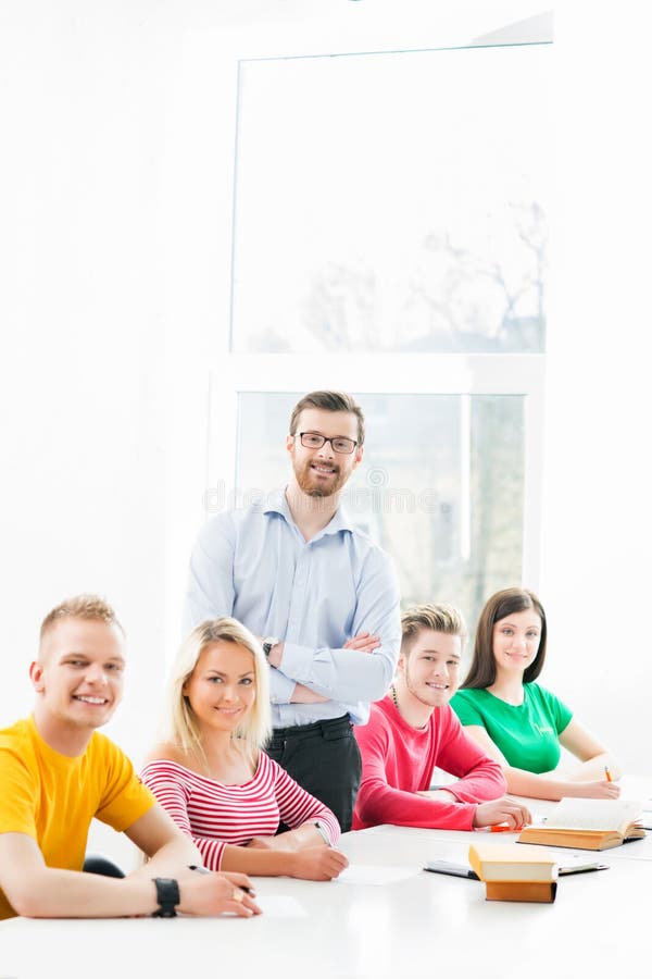 Group of Teenage Students Studying at the Lesson Stock Photo - Image of ...