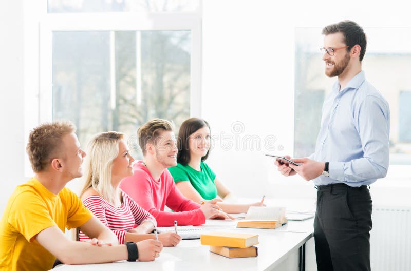 Group of Teenage Students Studying at the Lesson in the Classroom Stock ...