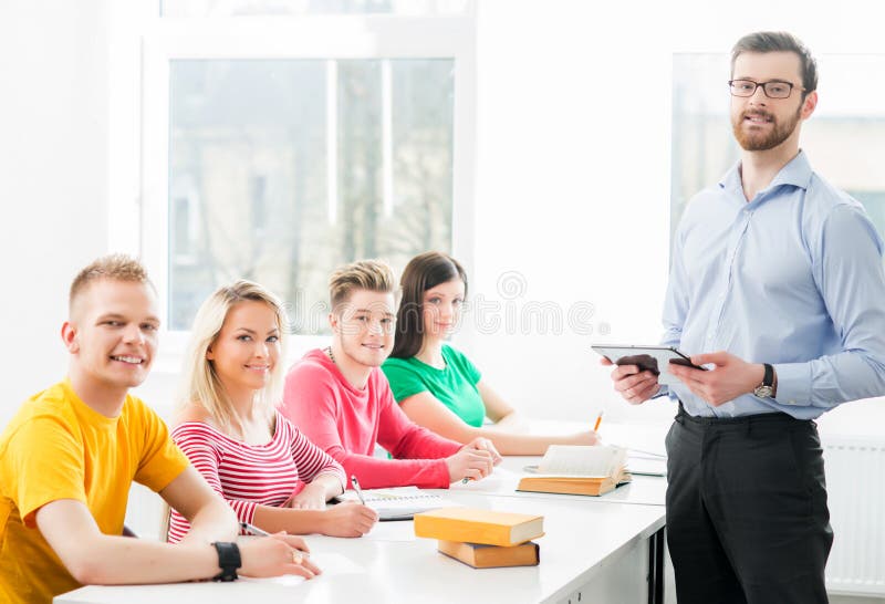 Group of Teenage Students Studying at the Lesson in the Classroom Stock ...