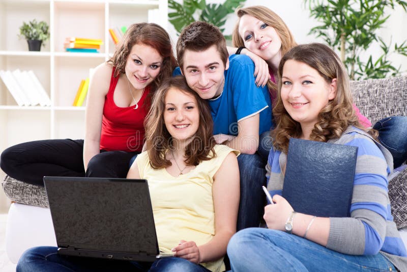 Group of teens with laptop stock photo. Image of people - 26731608