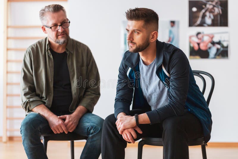 Group therapy for men stock image. Image of patient - 237571835