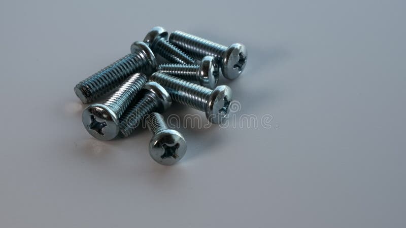Group of Threaded Bolts Rotating on a White Table. Stock Video - Video ...