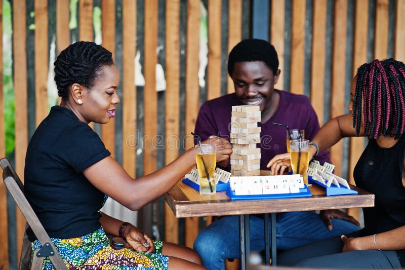Group of Three African American Friends Play Table Games Stock Image ...