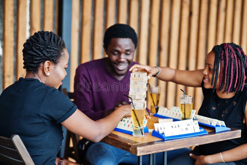 Group of Three African American Friends Play Table Games Stock Image ...