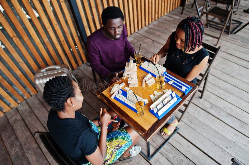 Group of Three African American Friends Play Table Games Stock Image ...