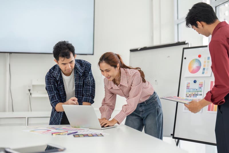 Teamwork and Innovation. Professionals Analyzing Design Elements and ...