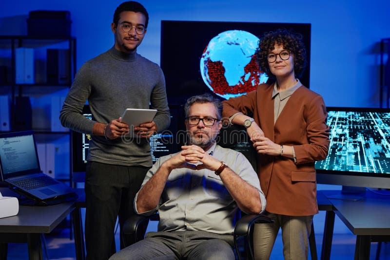 Group of Three Interculltural Programmers Looking at Camera Stock Photo ... Group of Three Interculltural Programmers Looking at Camera Stock Photo ...