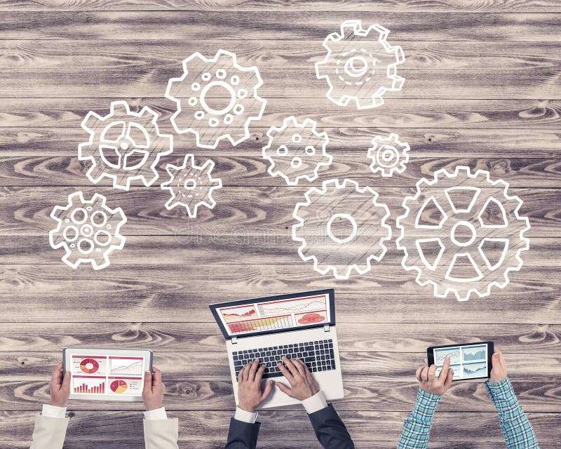 Top View of Businesspeople Sitting at Table and Using Gadgets Stock ...