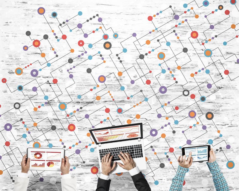 Top View of Businesspeople Sitting at Table and Using Gadgets Stock ...