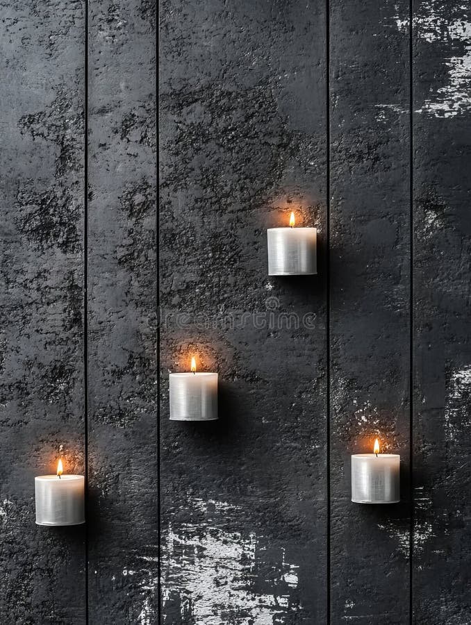 A Group of Three White Candles Sitting on Top of a Wooden Wall Stock ...