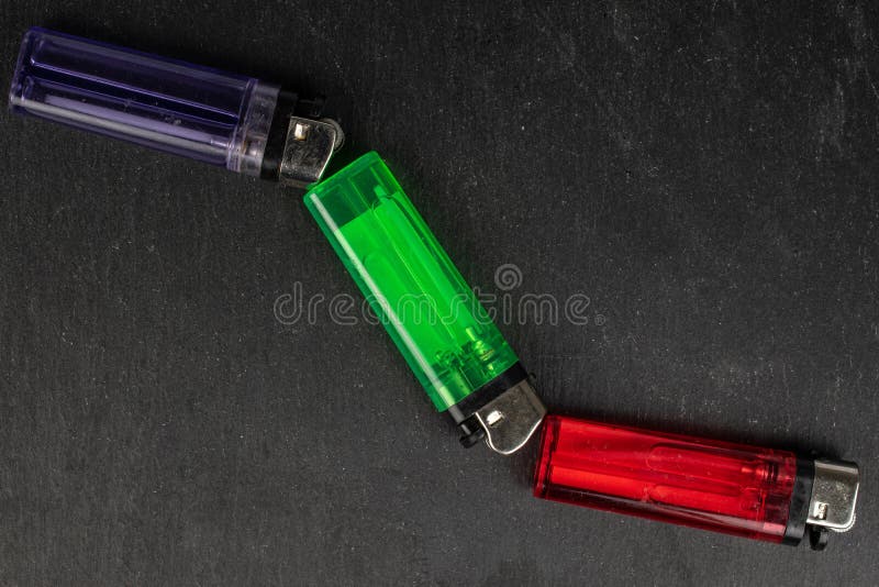 Plastic Lighter on Grey Stone Stock Photo - Image of light, green ...