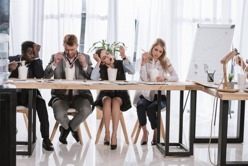 Multiethnic Group of Exhausted Businesspeople Sleeping Stock Photo ... Multiethnic Group of Exhausted Businesspeople Sleeping Stock Photo ...
