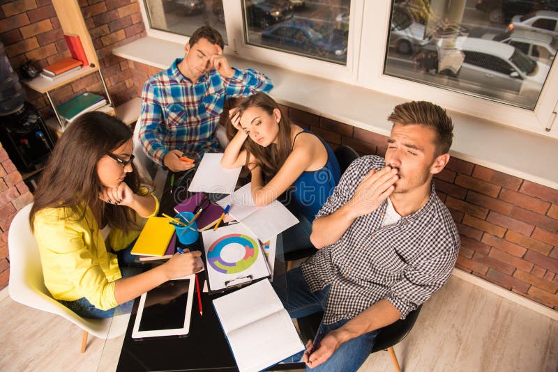 Group of Tired Students Sleeping on the Table Stock Photo - Image of ...