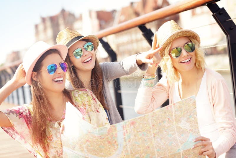 Group of Tourists Using Map in the City Stock Photo - Image of ...