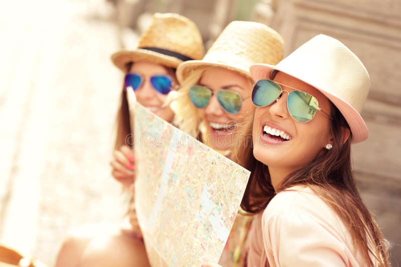 Group of Tourists Using Map in the City Stock Photo - Image of looking ...